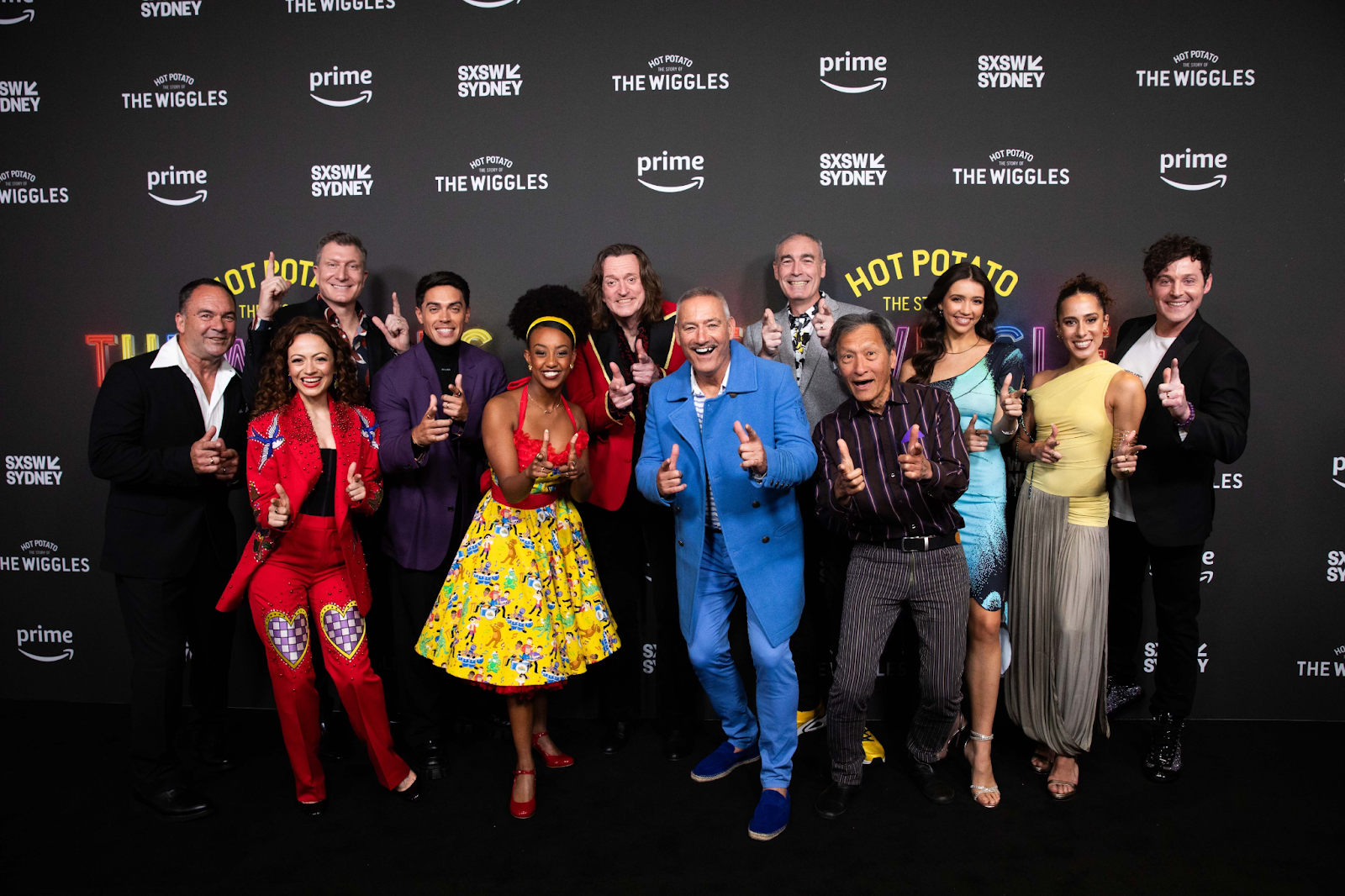 The Wiggles and Director Sally Aitken walk the black carpet